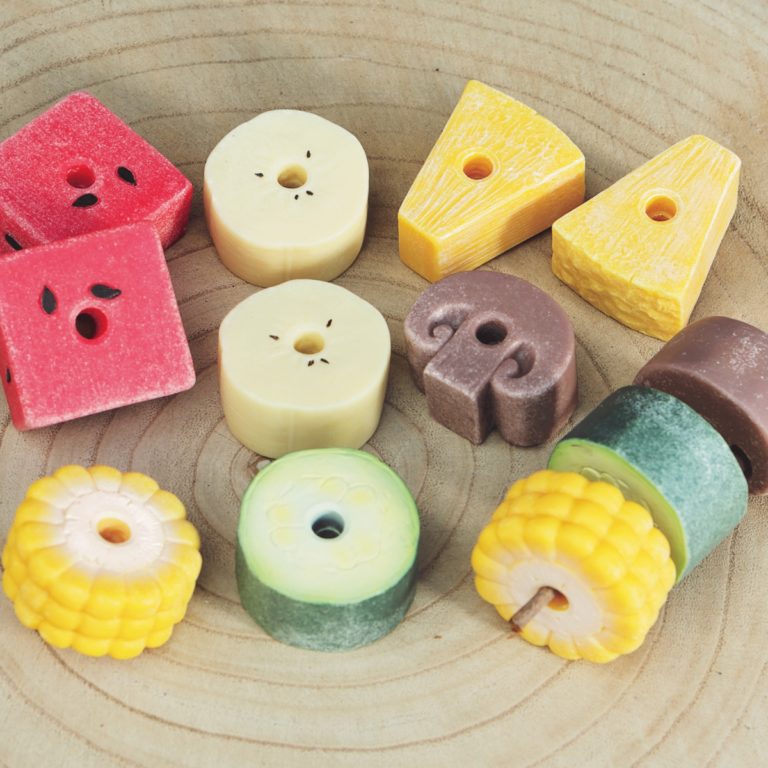 Realistic play fruits made from stone for mud kitchens